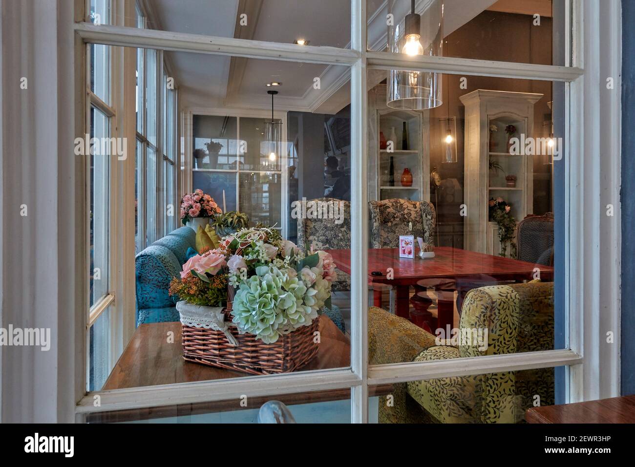 View through window of Boutique Restaurant interior furnishings Stock ...