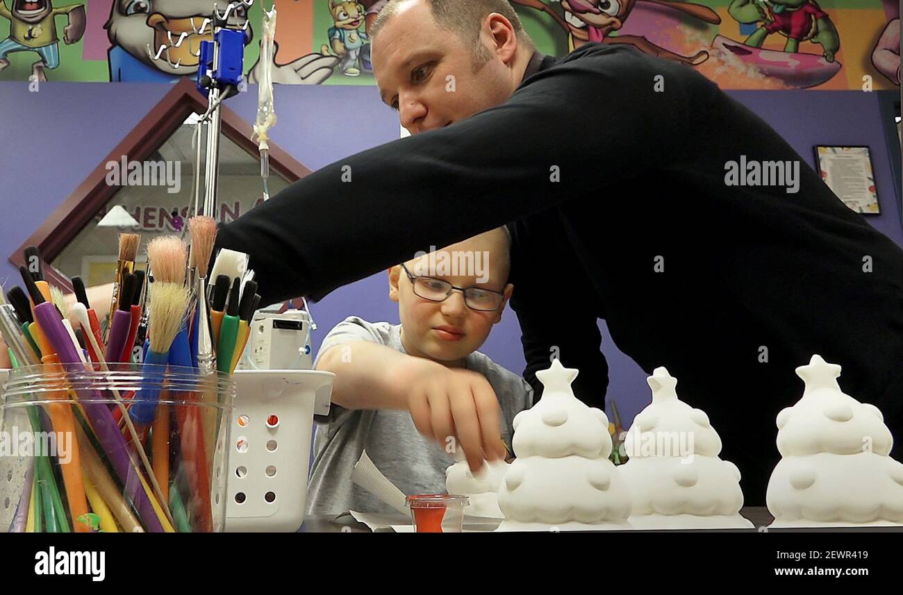 An artistic diversion occupies 9-year-old Alexander Goodwin at Children ...