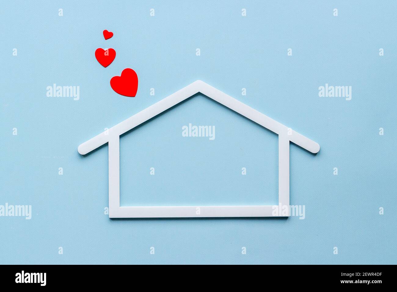 House shape with heart. Love family concept Stock Photo - Alamy