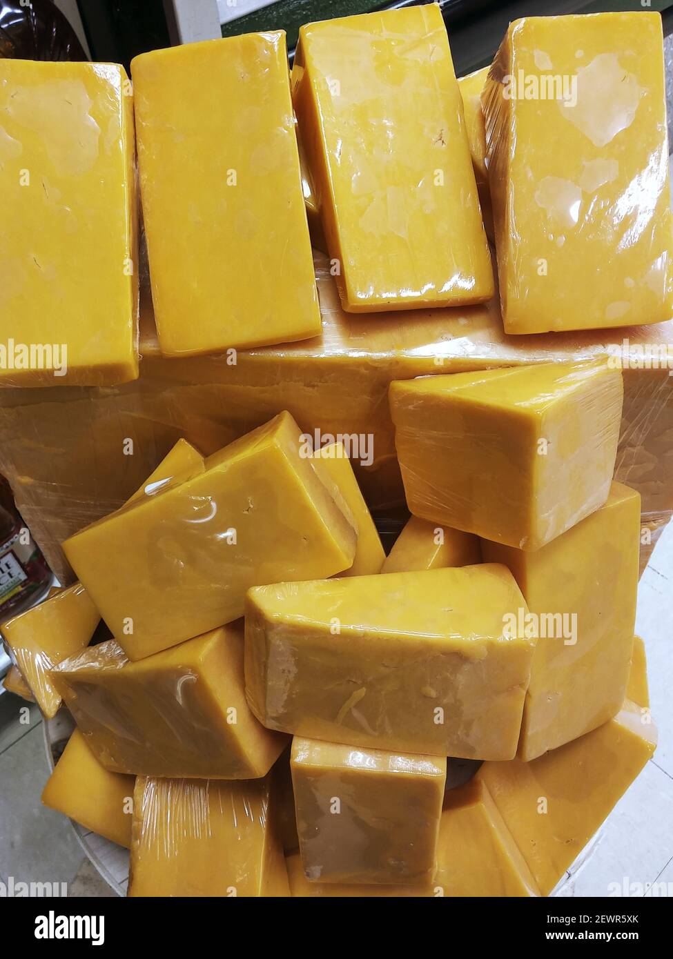 Packages of generic Cheddar Cheese are seen in a supermarket in New ...