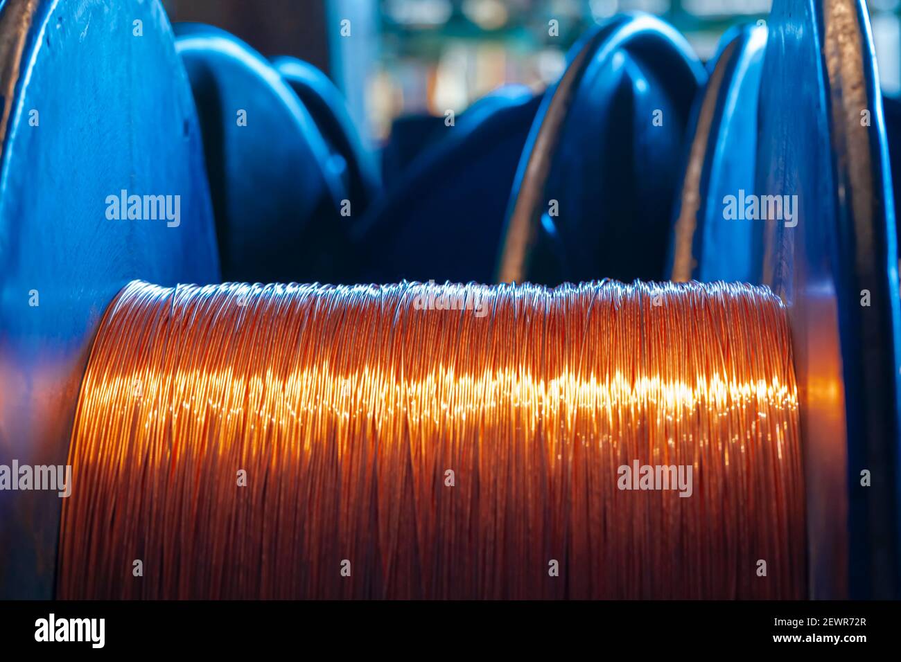 Copper wire reels in cable factory close up Stock Photo - Alamy