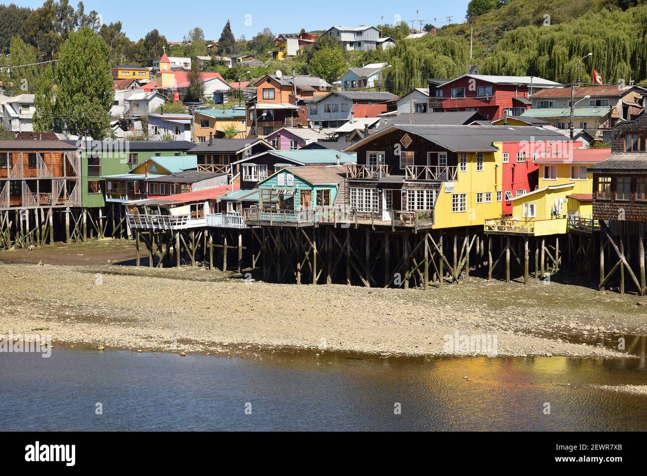 Colorful palafitos (stilt houses) in the city of Castro, Chile, line ...
