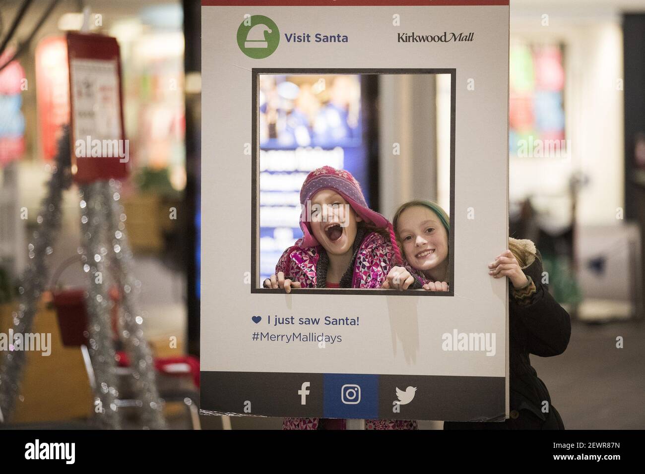 Isabelle, left, and Abby Carlsen pose for a photo at Kirkland Mall Dec ...