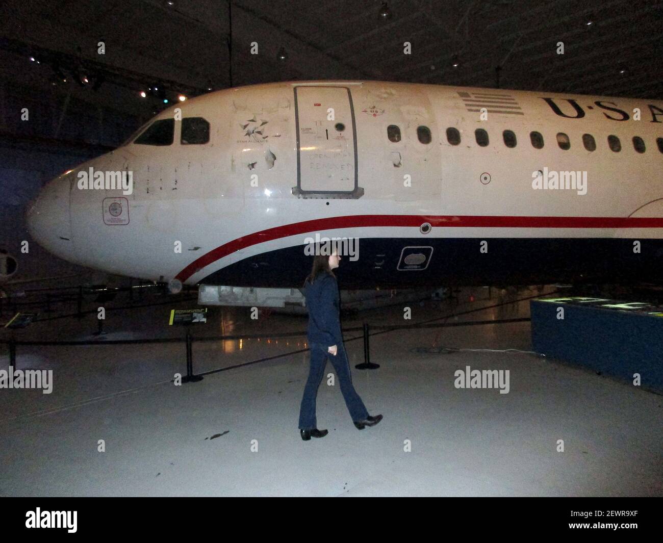 The roped-off Airbus A320 sits low to the ground so that the jet's tall ...