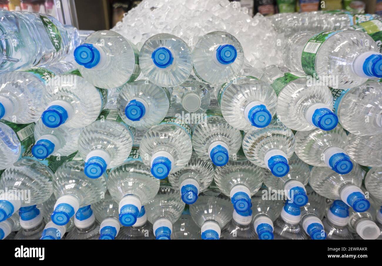 A display of bottled water is seen in a grocery in New York on Monday ...