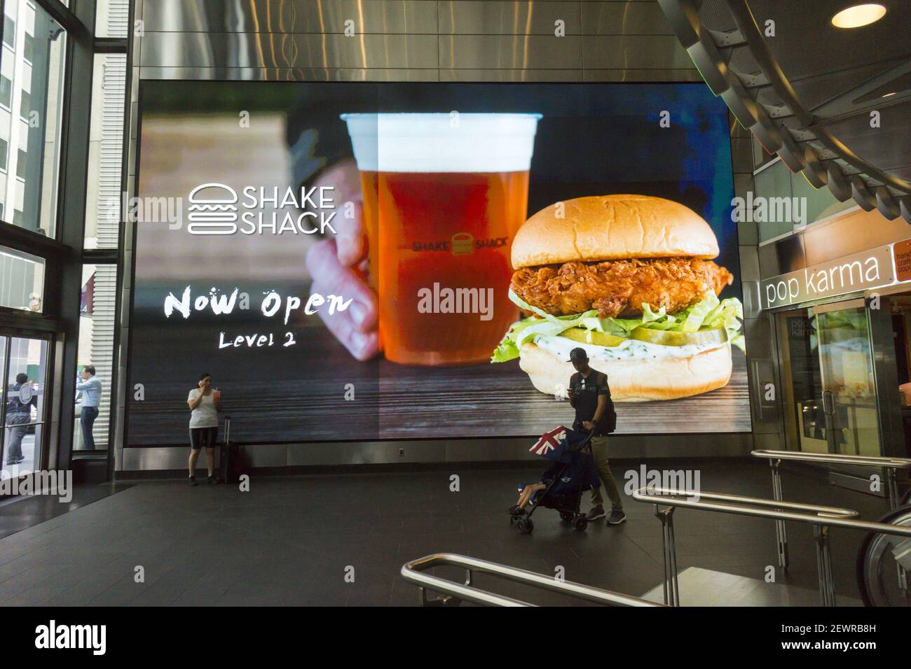 Advertising for the newly opened Shake Shack restaurant in the Fulton ...