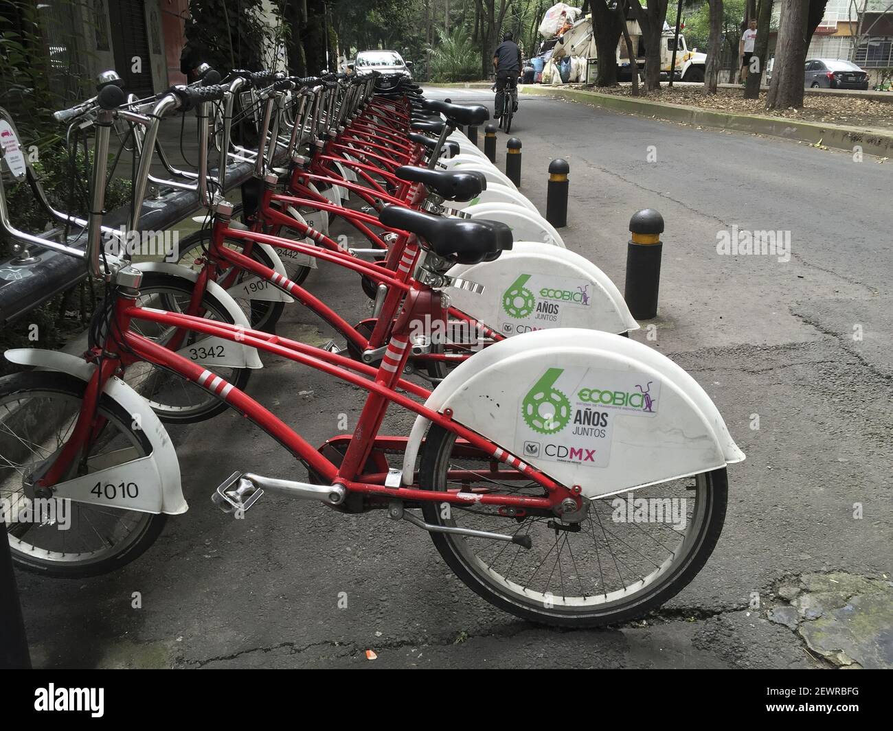 Red bikes from EcoBici, a bicycle sharing system, are a common sight on ...
