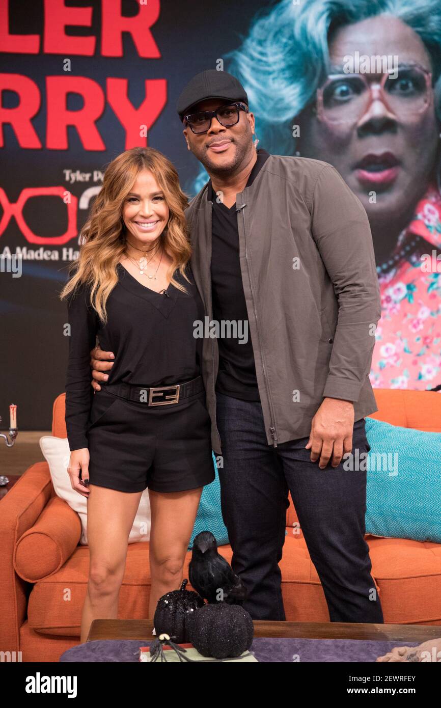MIAMI, FLORIDA-OCTOBER 11: Karla Martinez and actor Tyler Perry are ...