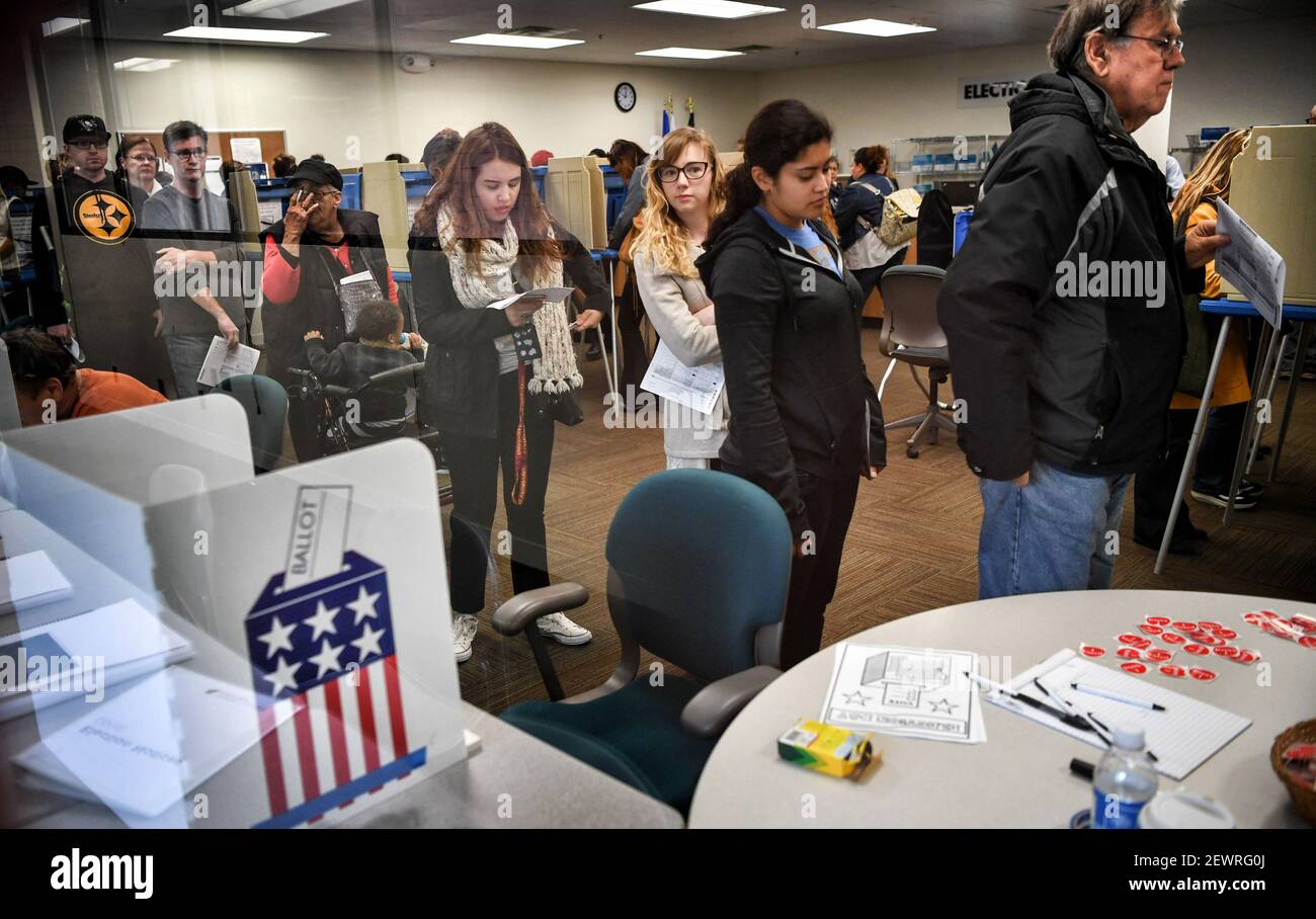 People line up to cast their ballots early on Monday, Nov. 7, 2016 at ...