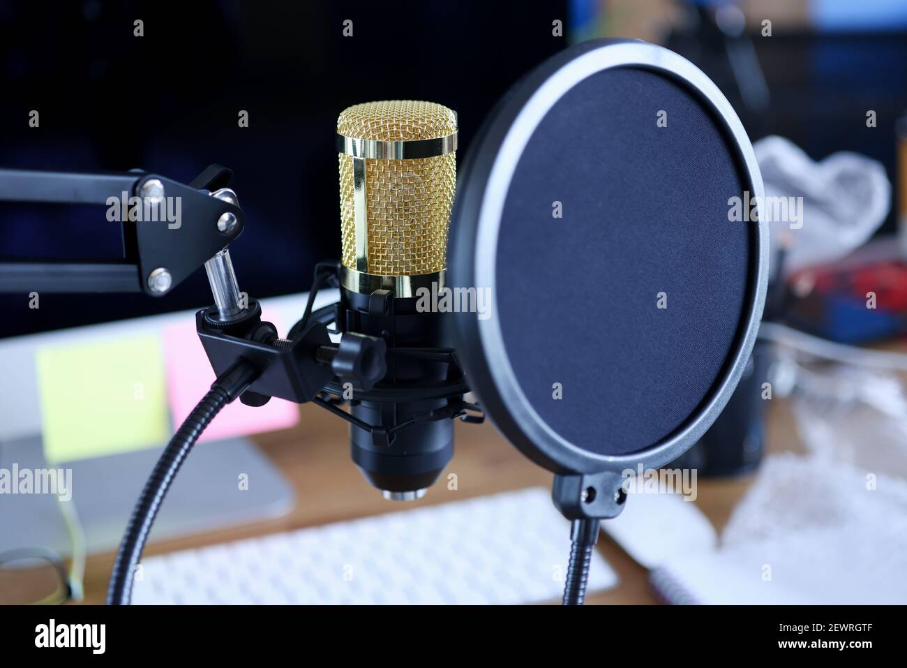 Studio microphone with screen in recording studio Stock Photo - Alamy