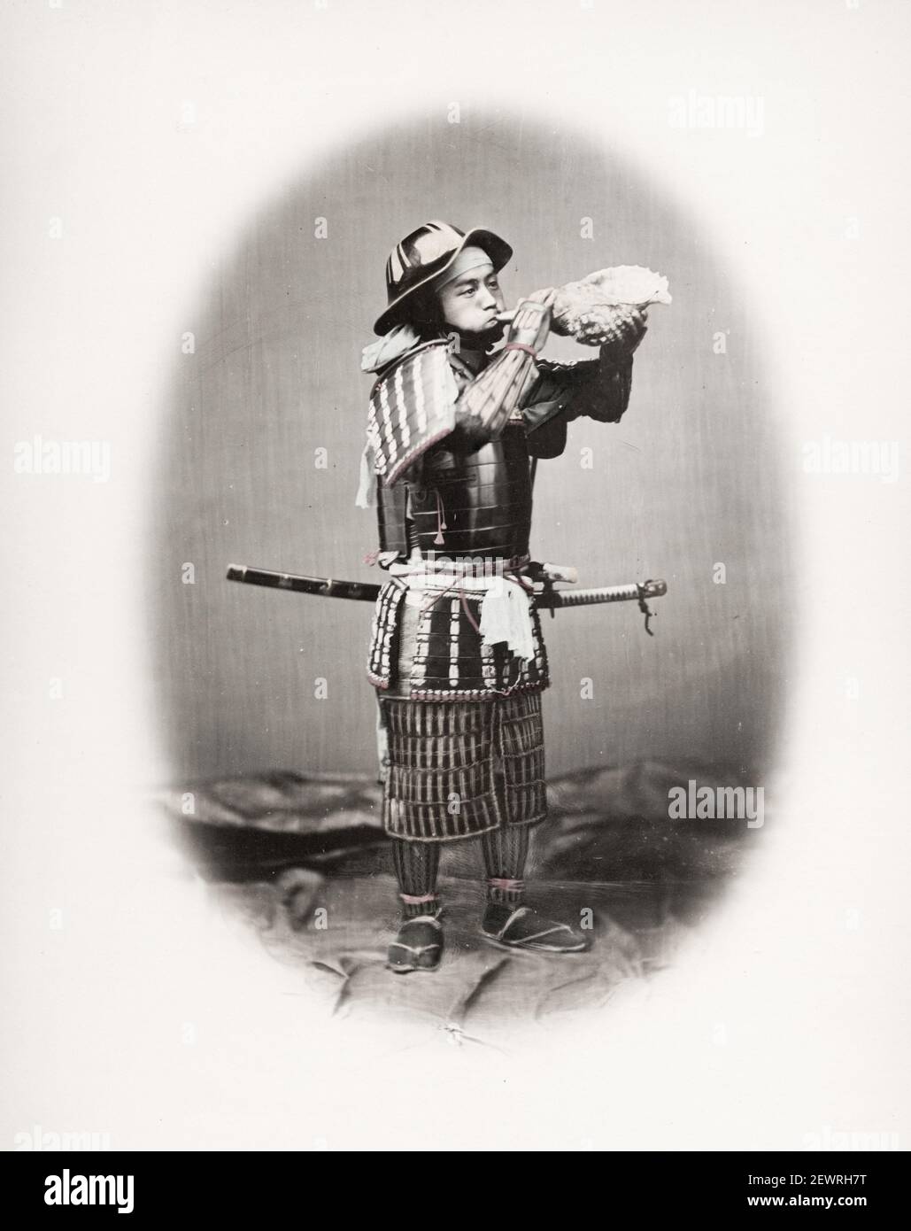 Vintage late 19th century photograph: Samurai in armour with conch ...