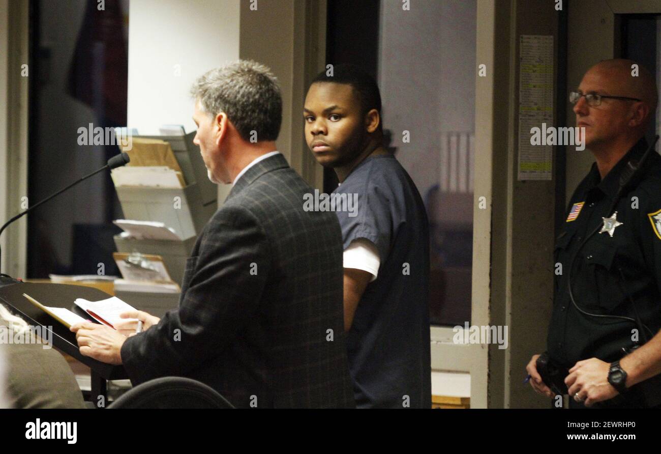 Malachi Love-Robinson of West Palm Beach, Fla., looks over at his ...