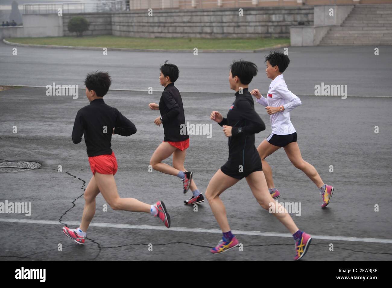 People exercise while running outside. General views of North Korea ...