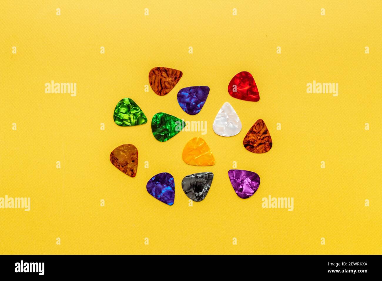 Guitar picks pattern. top view. Music background Stock Photo - Alamy