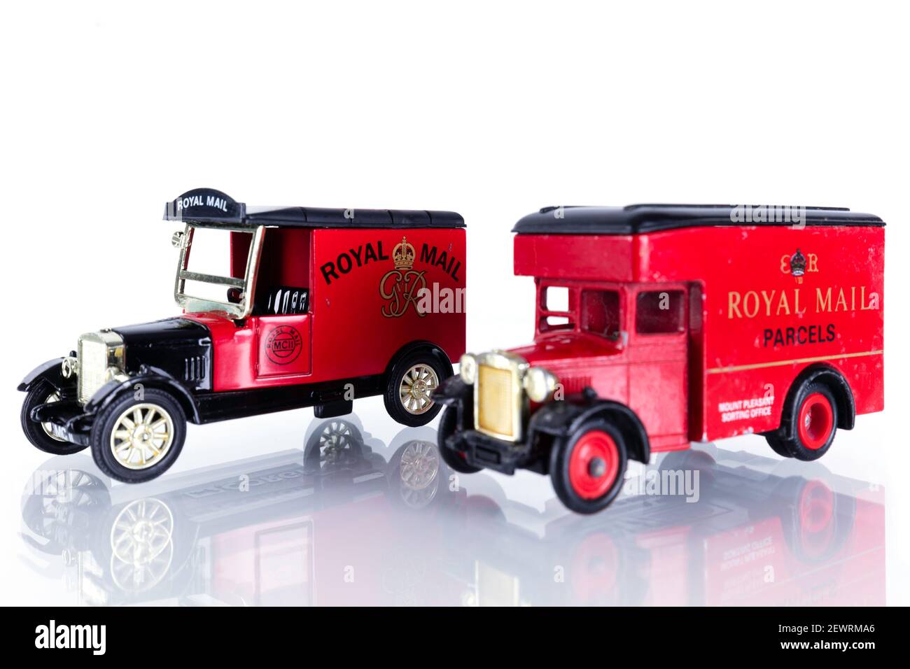 Worn diecast models of Royal Mail vans. Isolated on a white background ...