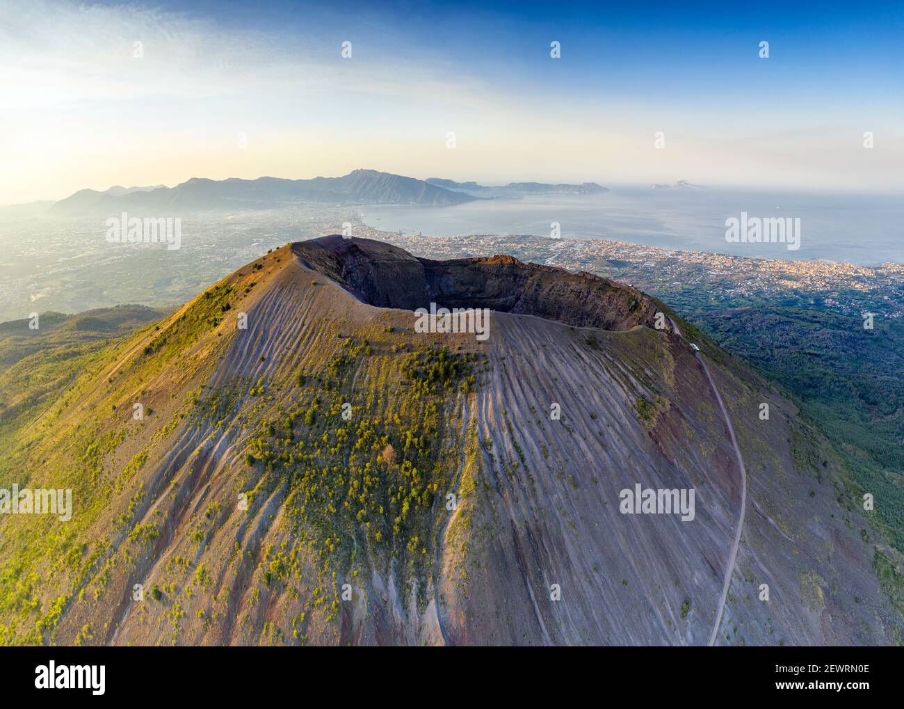 Aerial view of Vesuvius crater and Gulf of Naples at sunrise, Naples ...