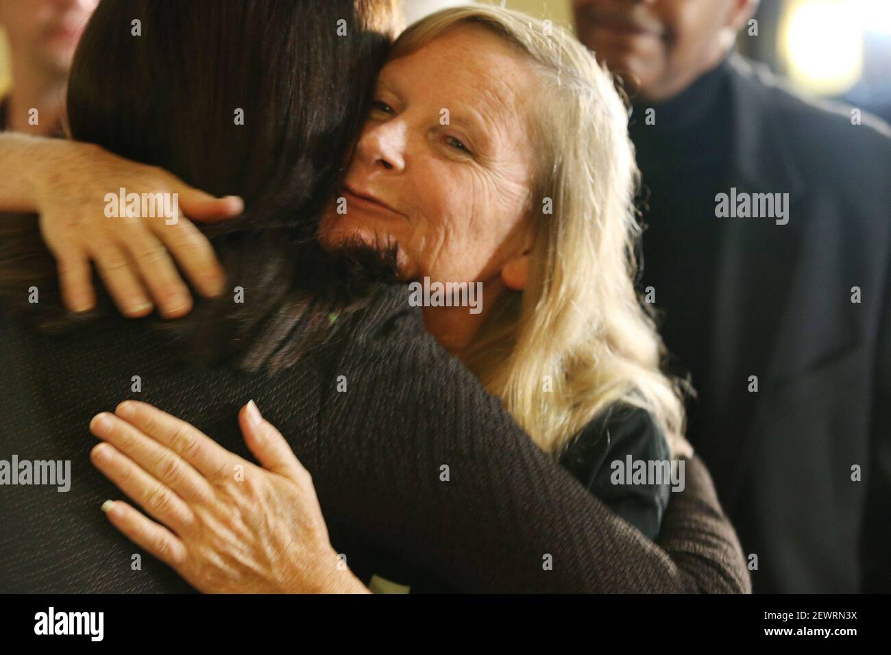 Cheryl Calusinski, mother of Melissa Calusinski, hugs her daughter's ...