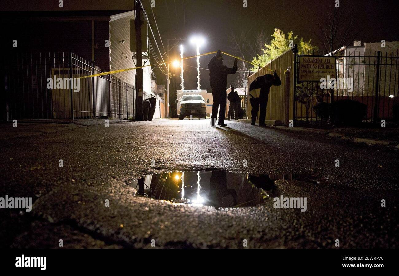 Police work the scene where Kajuan Raye was fatally shot by Sgt. John ...
