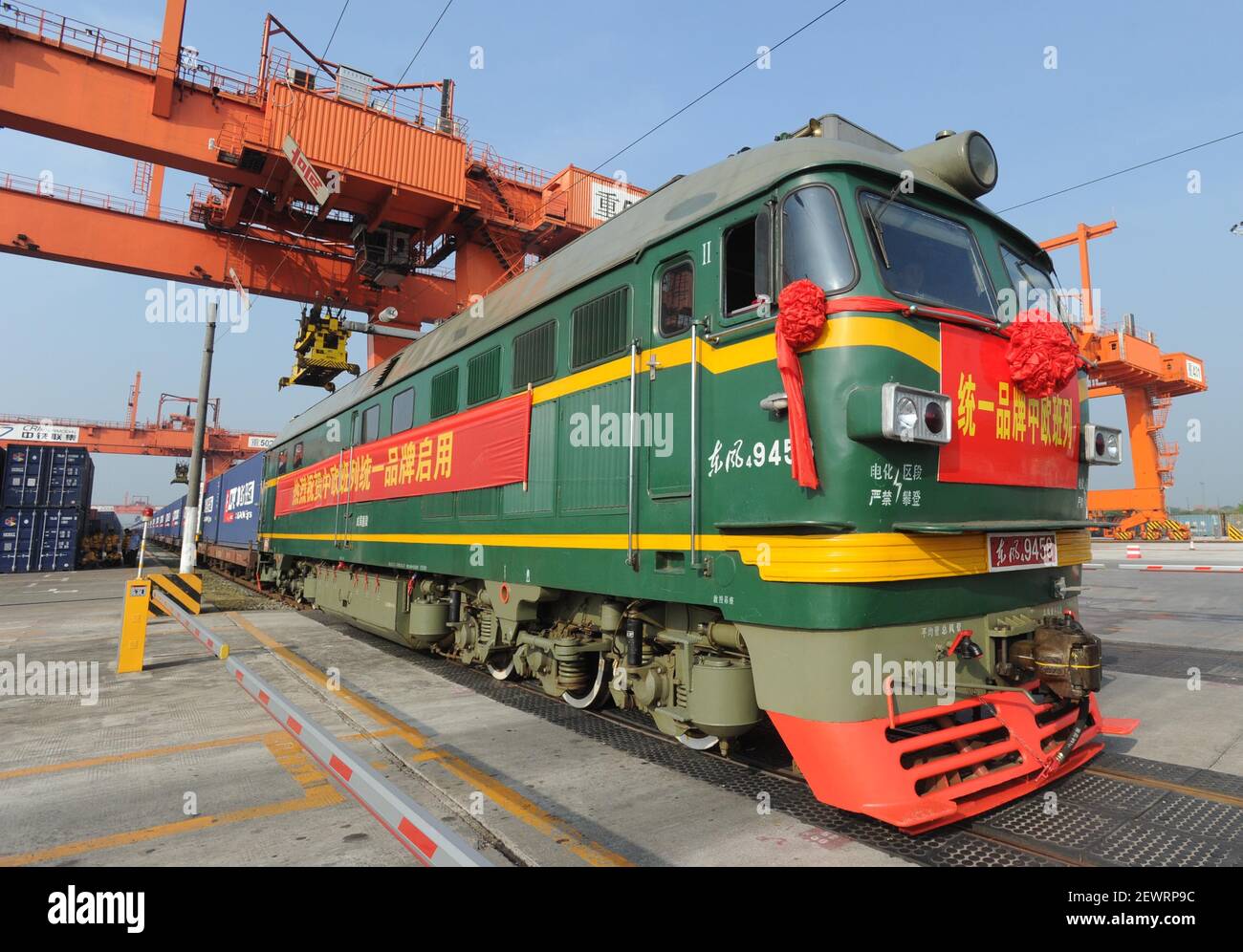 A container train of China Railway Express leaves a railway station for ...
