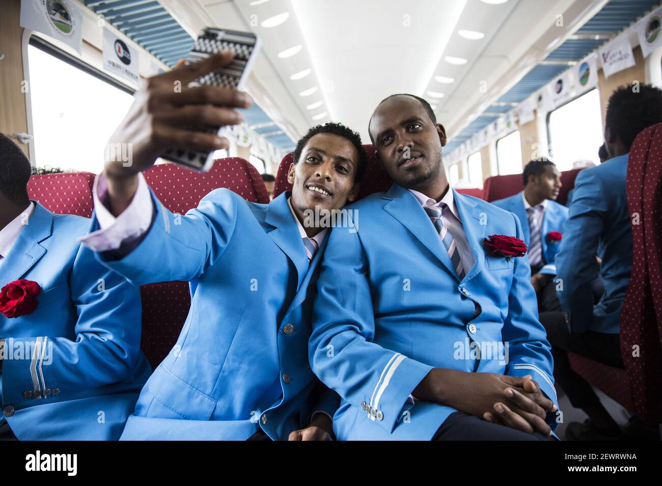 --FILE--African attendants take the train running on the Addis Ababaâ ...