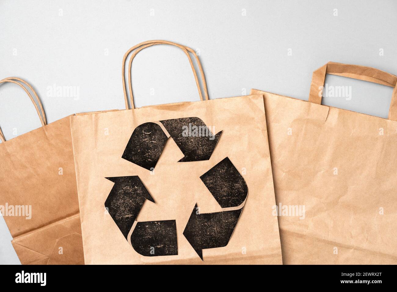 Concept of paper recycling, eco friendly consumerism Stock Photo - Alamy