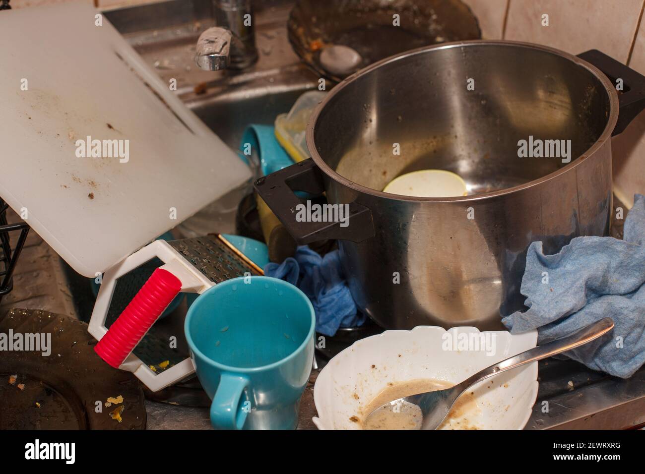 dirty dishes in the sink. mess in the kitchen. High quality photo Stock ...