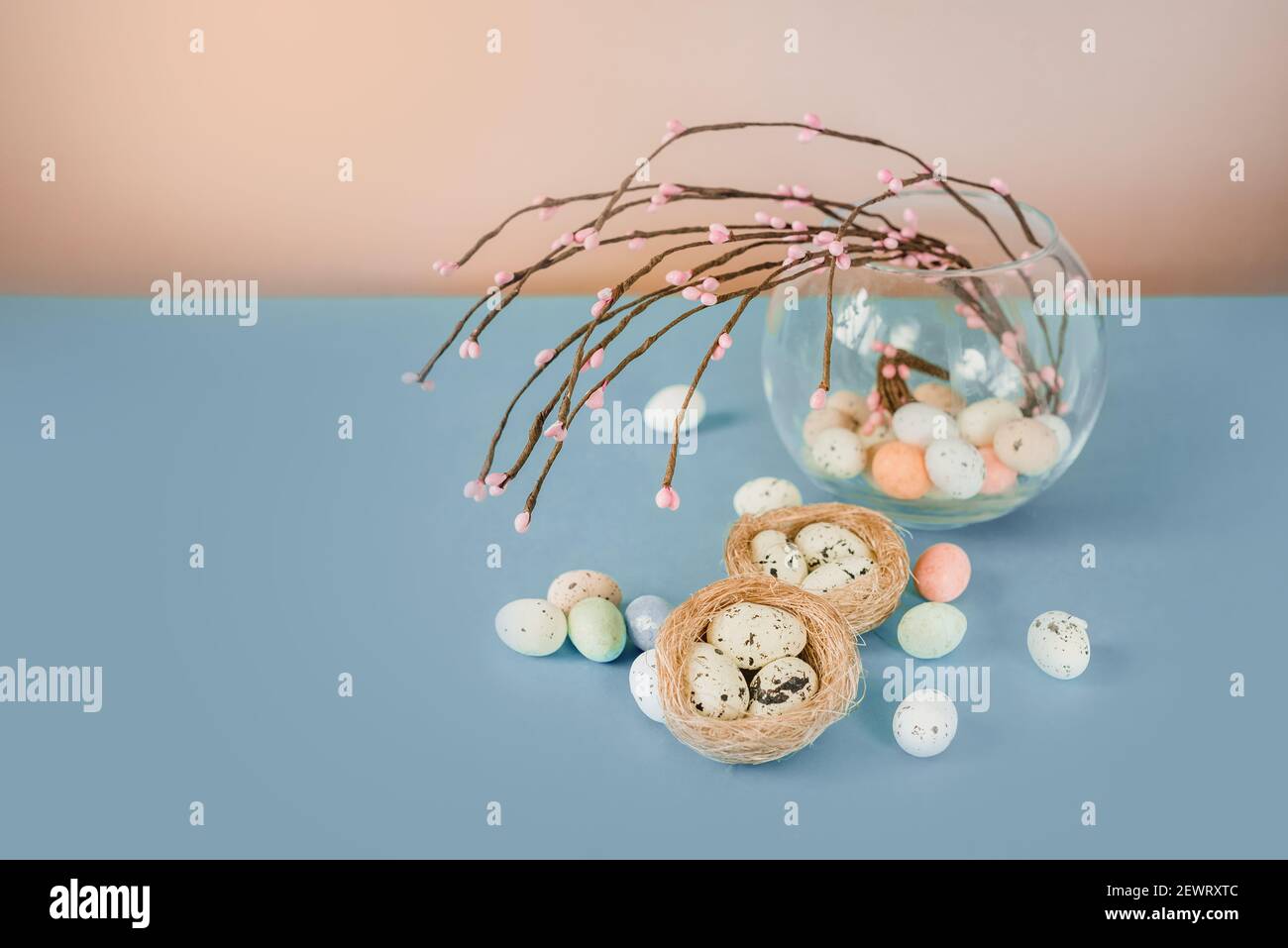 Easter background with colourful Easter eggs with bird's nest and ...