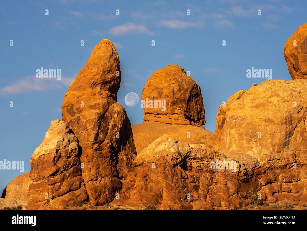 Moon view between the rocks, Arches National Park, Utah, United States ...