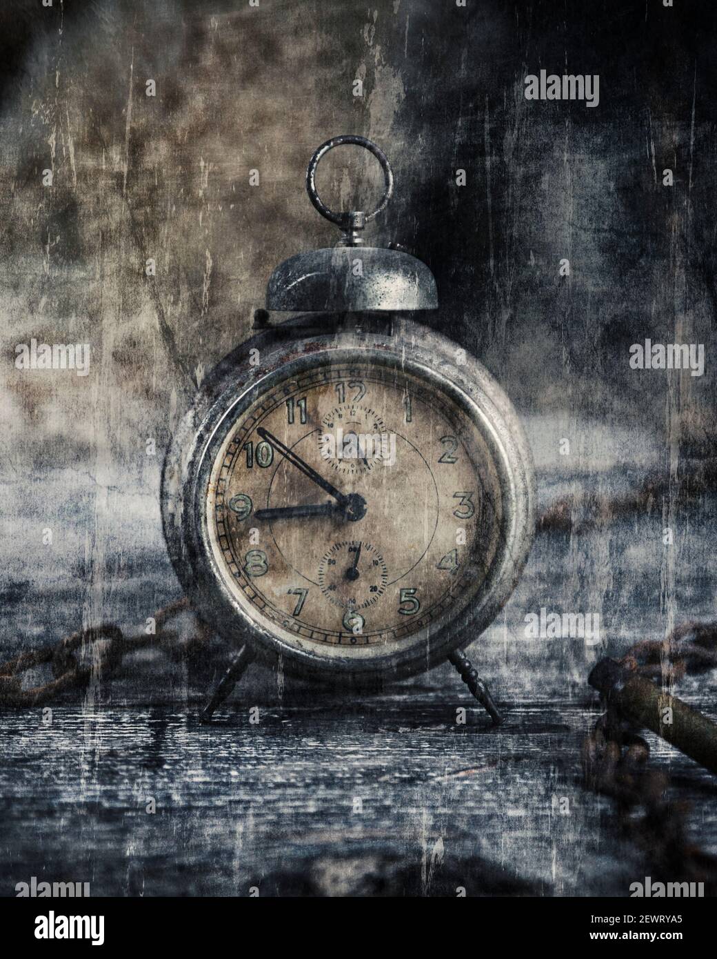 Vintage clock resting on wooden surface with military gas mask and ...