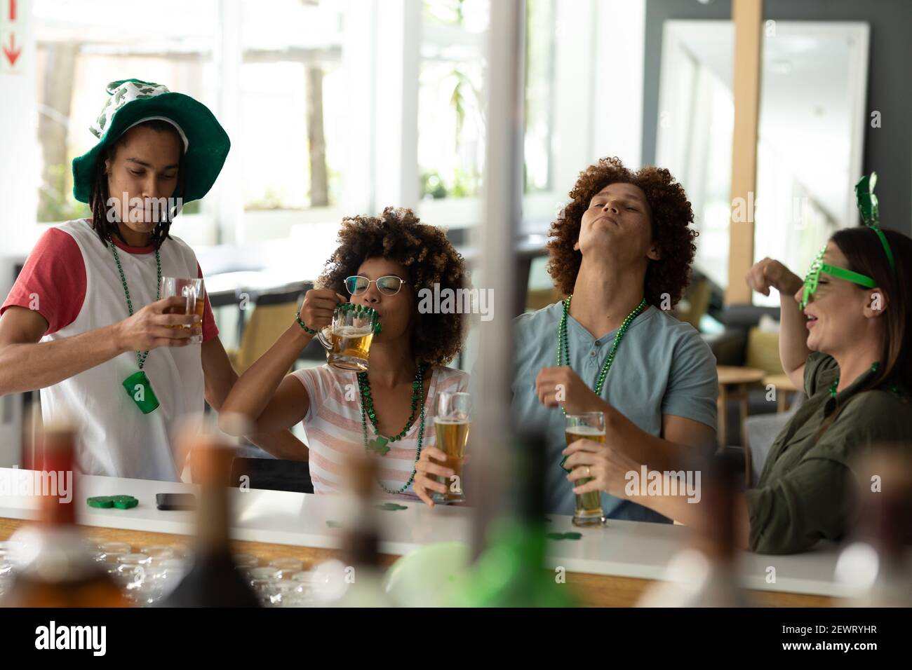 Group drinking at bar hi-res stock photography and images - Alamy