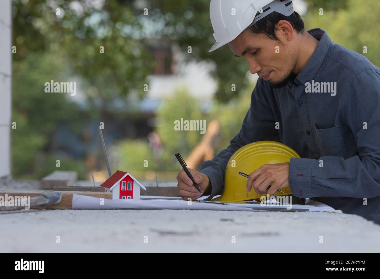 Architect worker Engineer soft focus work by laptop computer on site ...