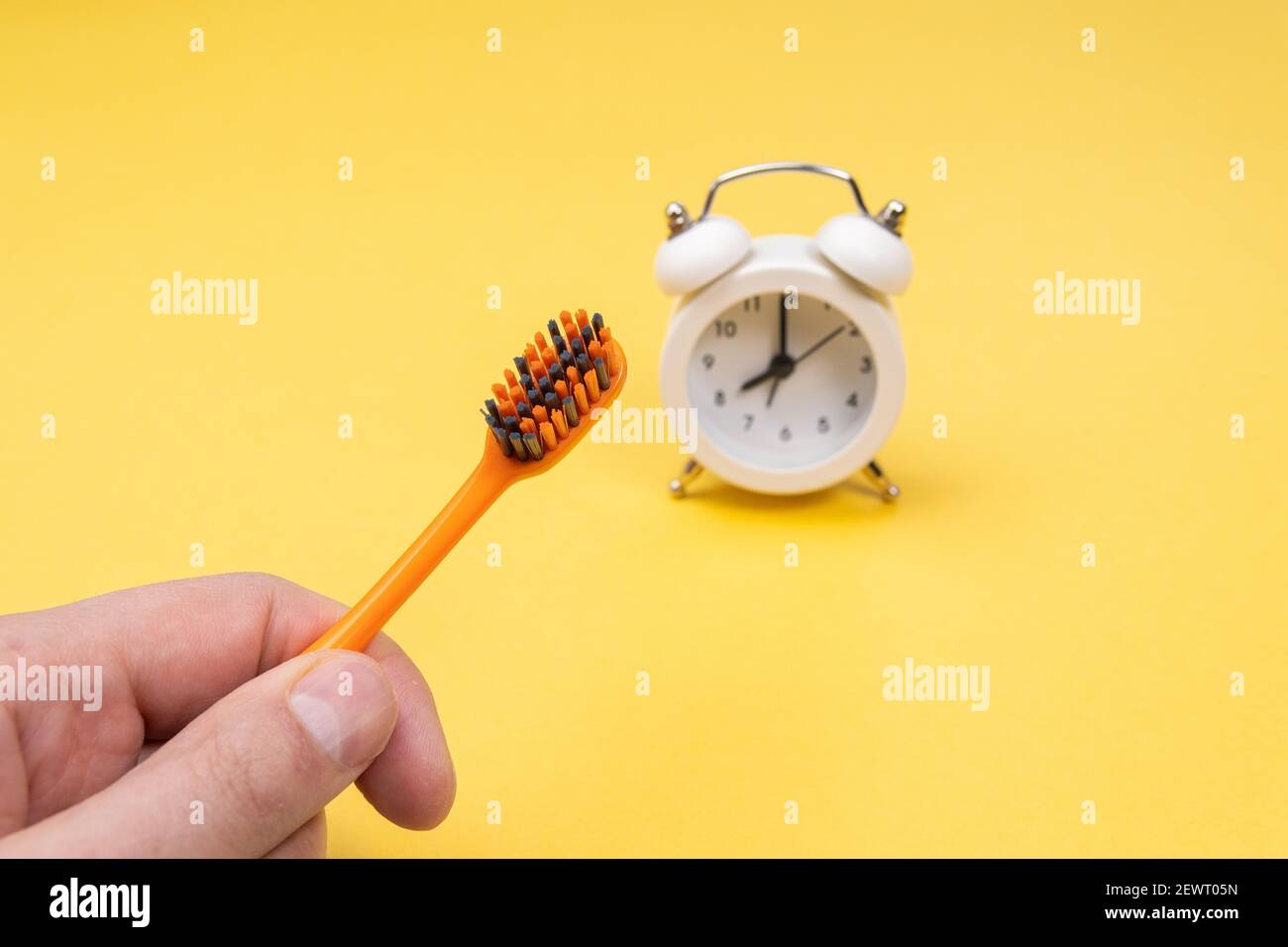 toothbrush and alarm clock time to brush your teeth before going to bed ...