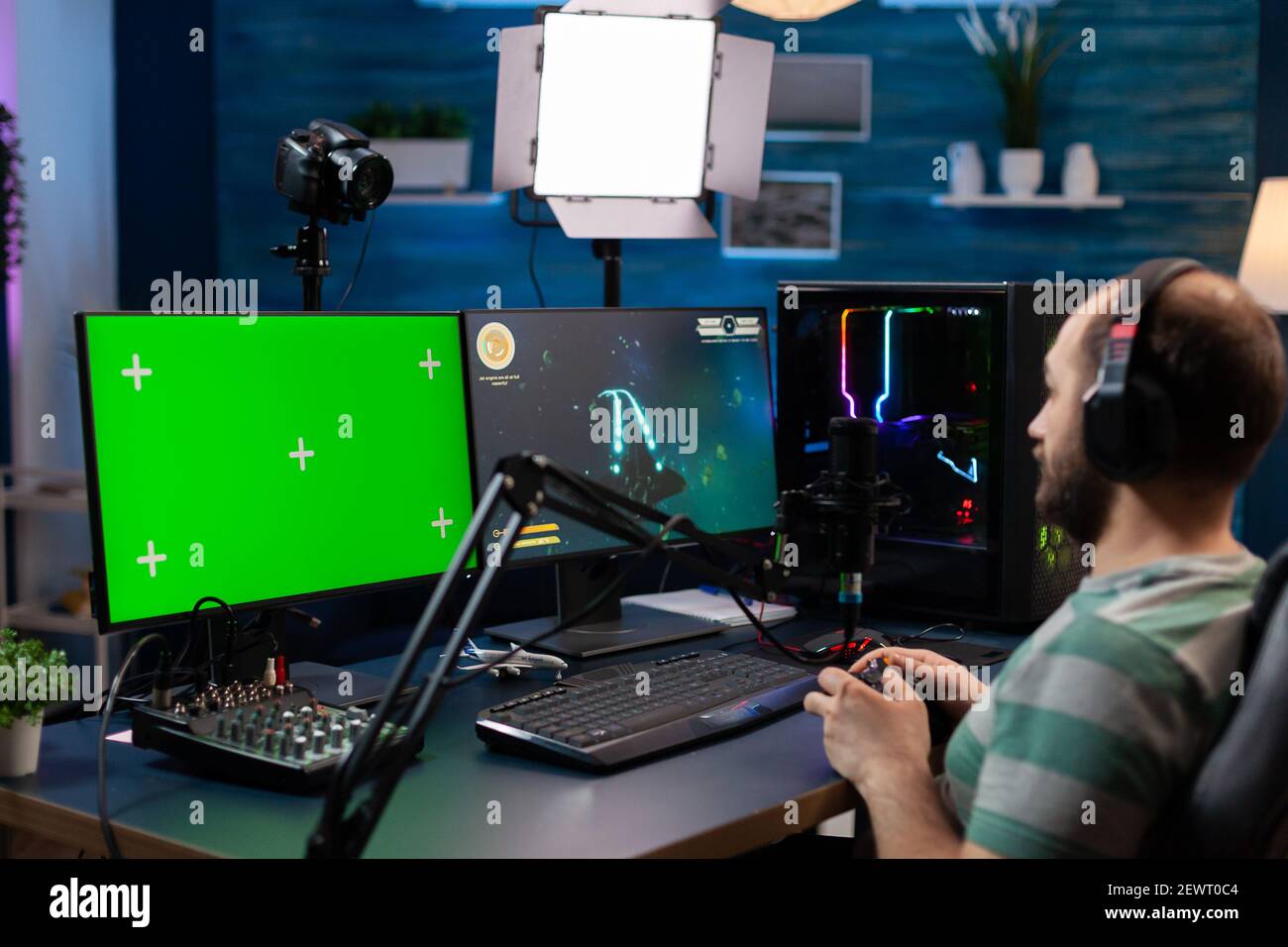 Caucasian man gamer streaming online videogames on professional ...