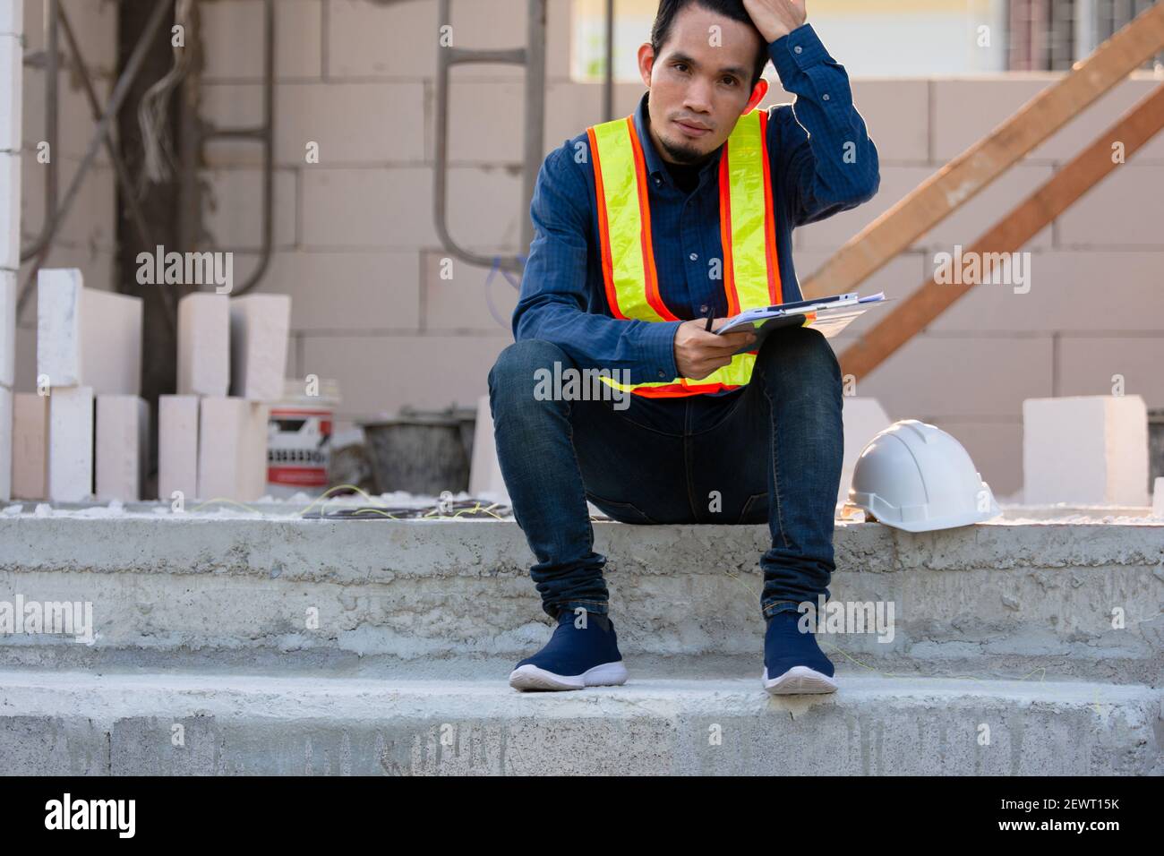 Worker employee work hard tried on site construction , Engineer ...