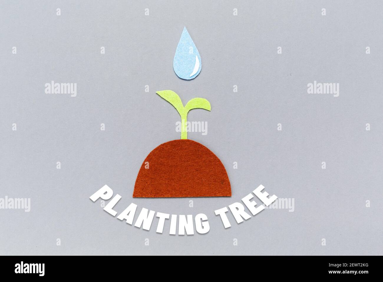 Planting trees. Cutted out of felt drop and soil with plant sprout ...