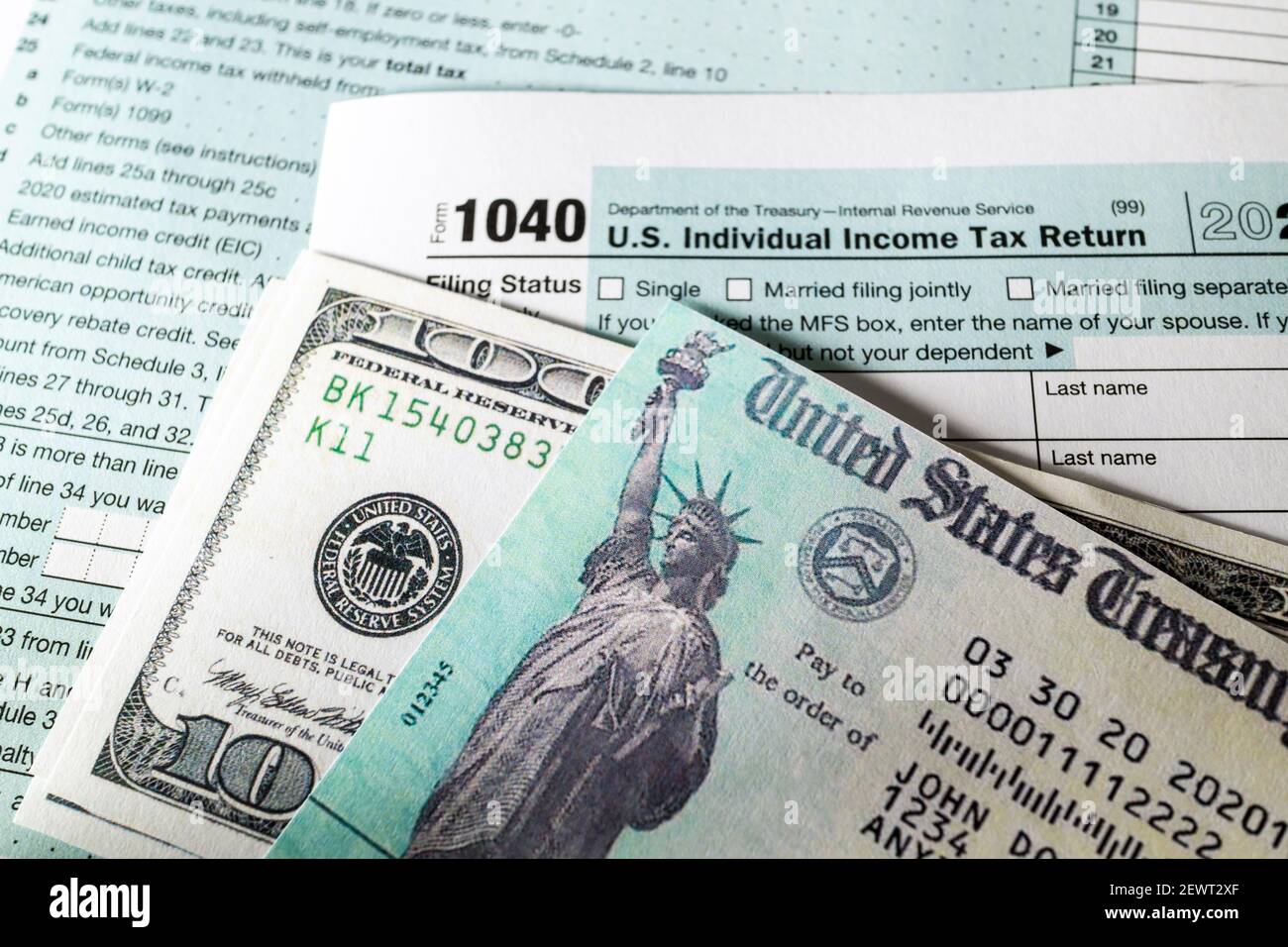 Tax refund check hi-res stock photography and images - Alamy