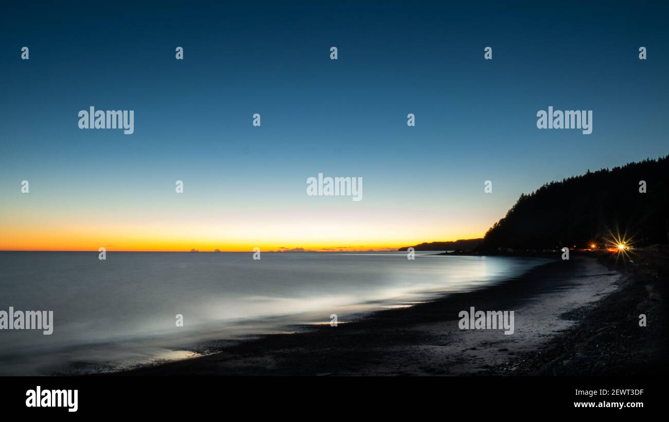 Beautiful early morning beach sunrise shot Stock Photo - Alamy
