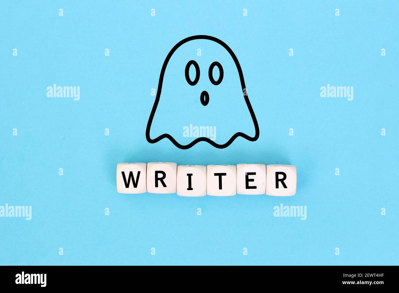 Ghostwriter concept with a ghost symbol and the word writer on wooden ...