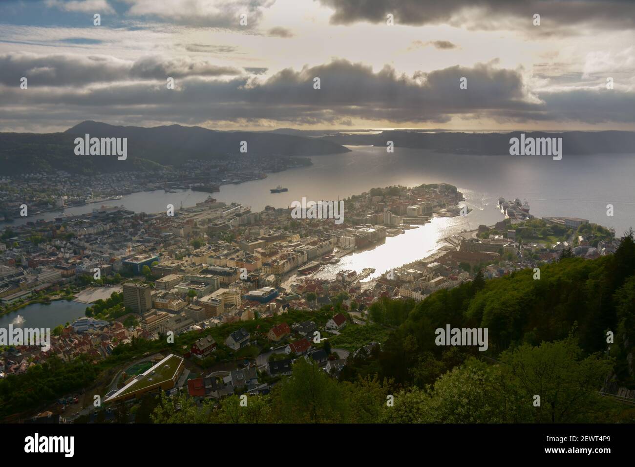 Beautiful scene bright rays of sun shining through the cloud layers ...