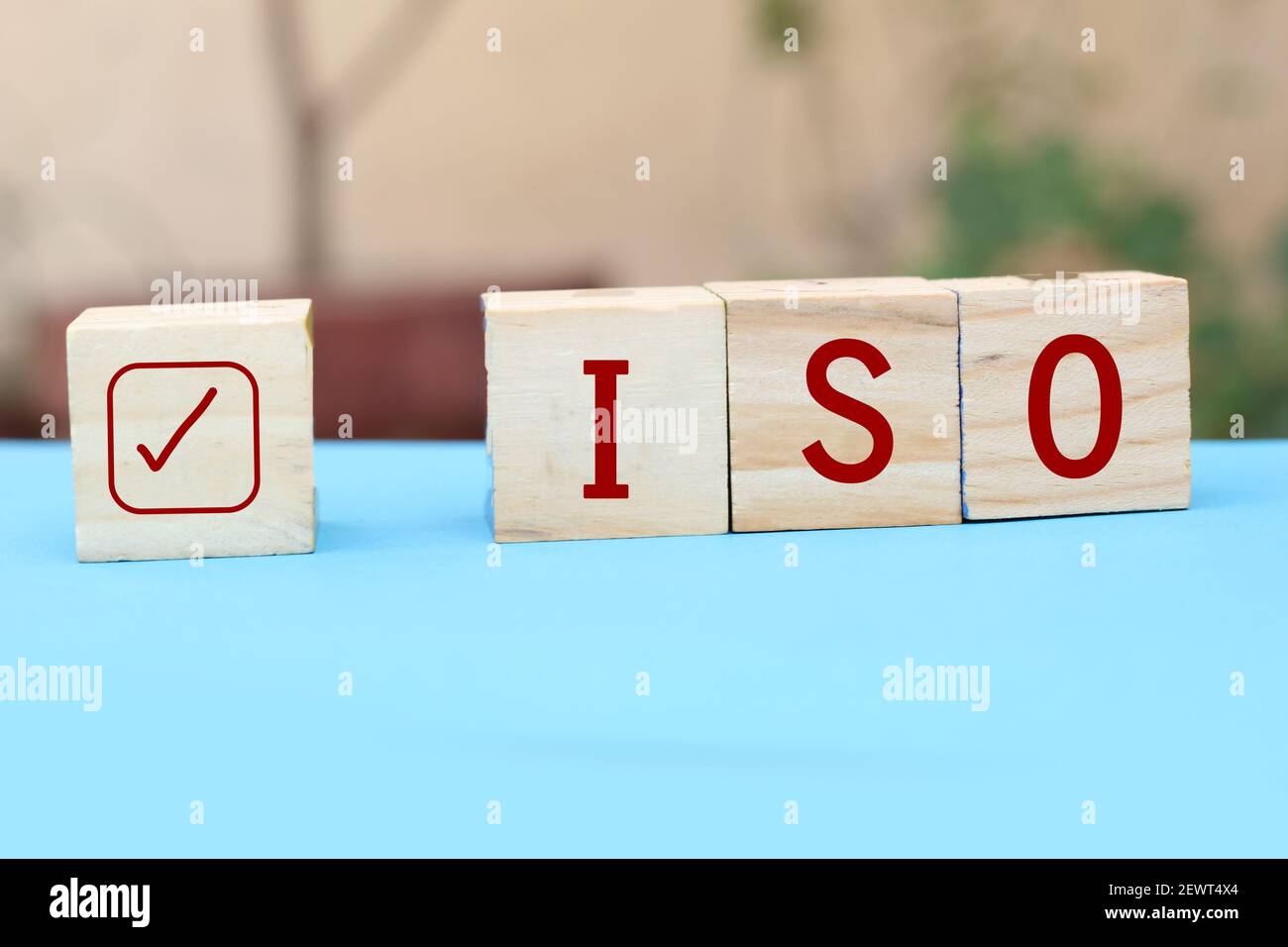 The Abbreviation ISO On Wooden Cubes With Check Mark On White Background ISO Quality Control the-abbreviation-iso-on-wooden-cubes-with-check-mark-on-white-background-iso-quality-control
