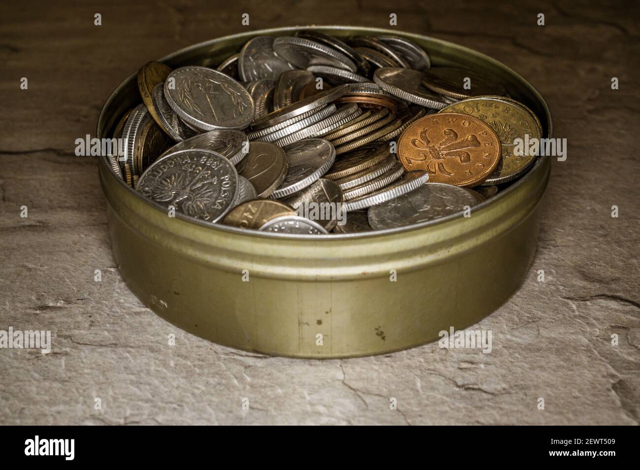 Many coins in container hi-res stock photography and images - Alamy