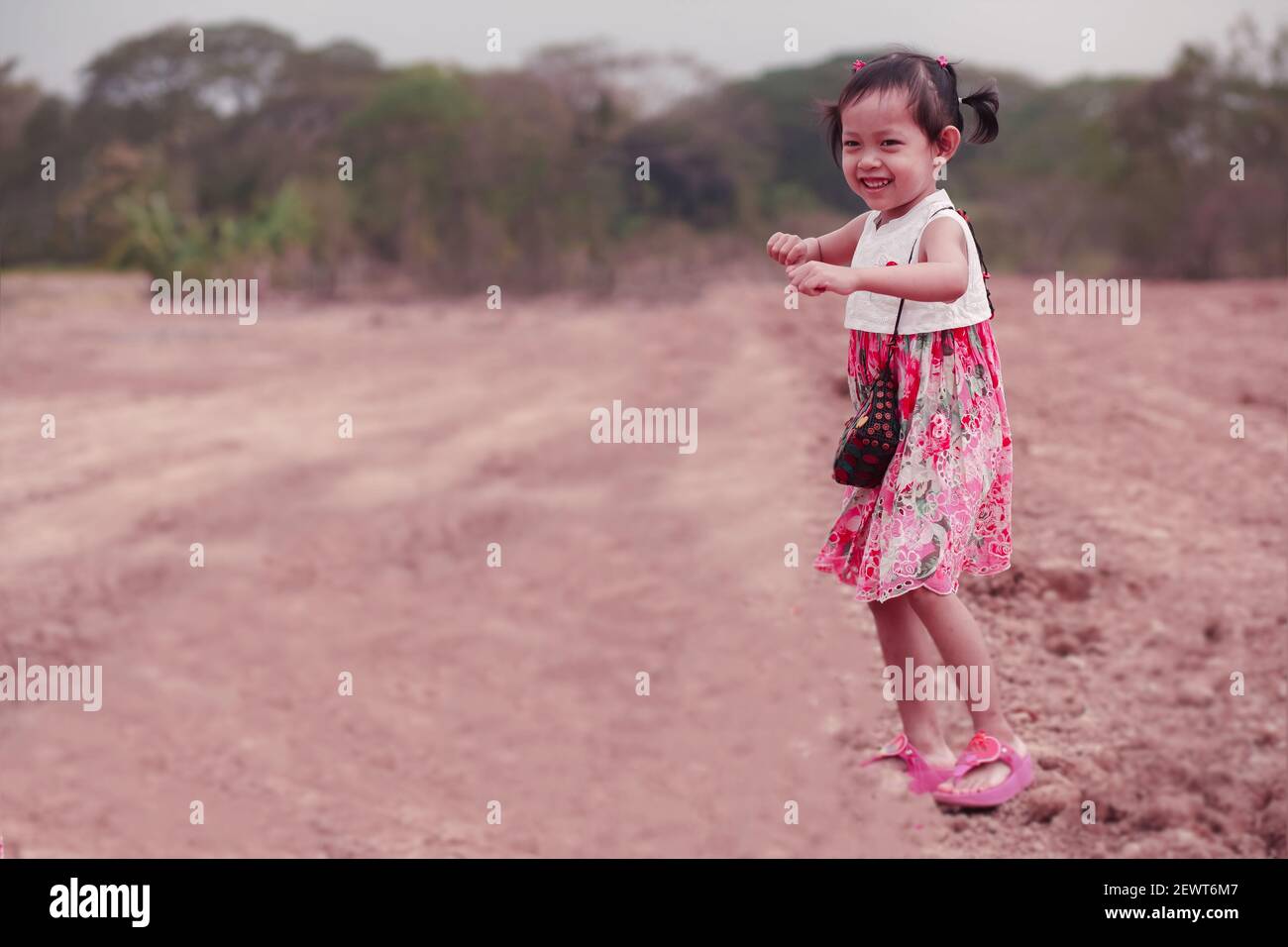 Portrait of happy dancing and smiling little child girl Stock Photo - Alamy