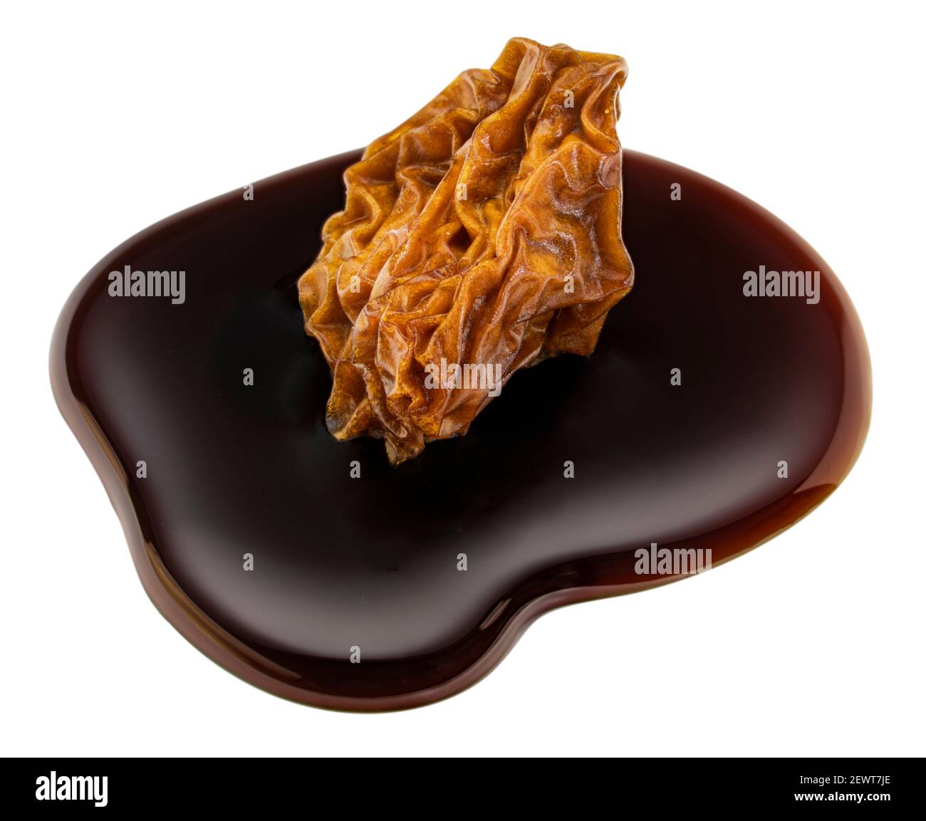 closeup of a dried goldenberry in yacon syrup, superfood concept Stock ...