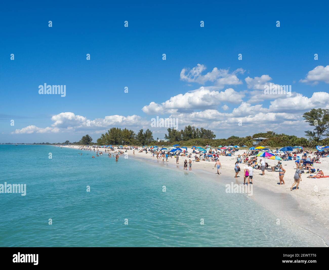North Jetty Beach on the Gulf of Mexico during high tourist season in ...
