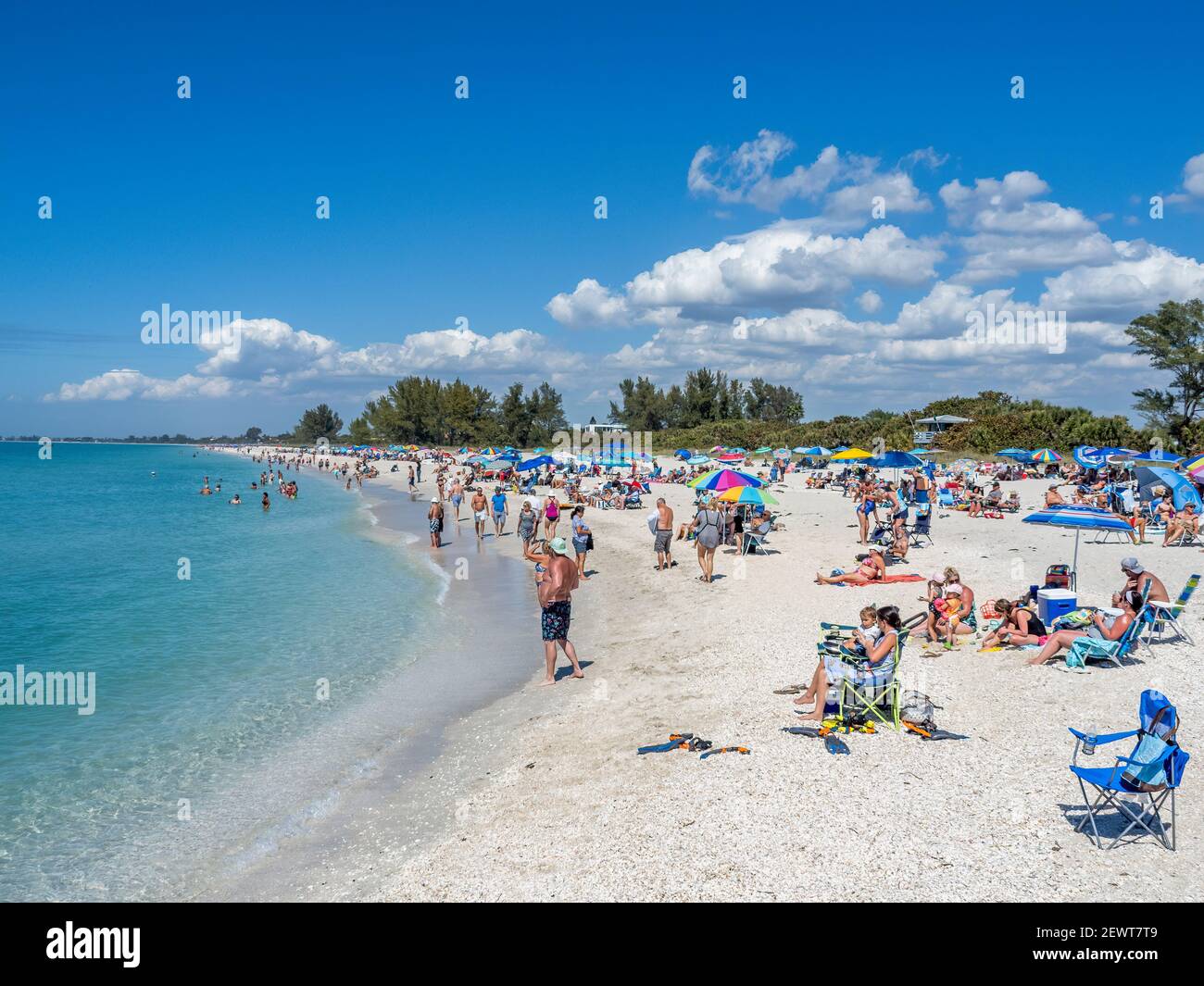 North Jetty Beach on the Gulf of Mexico during high tourist season in ...