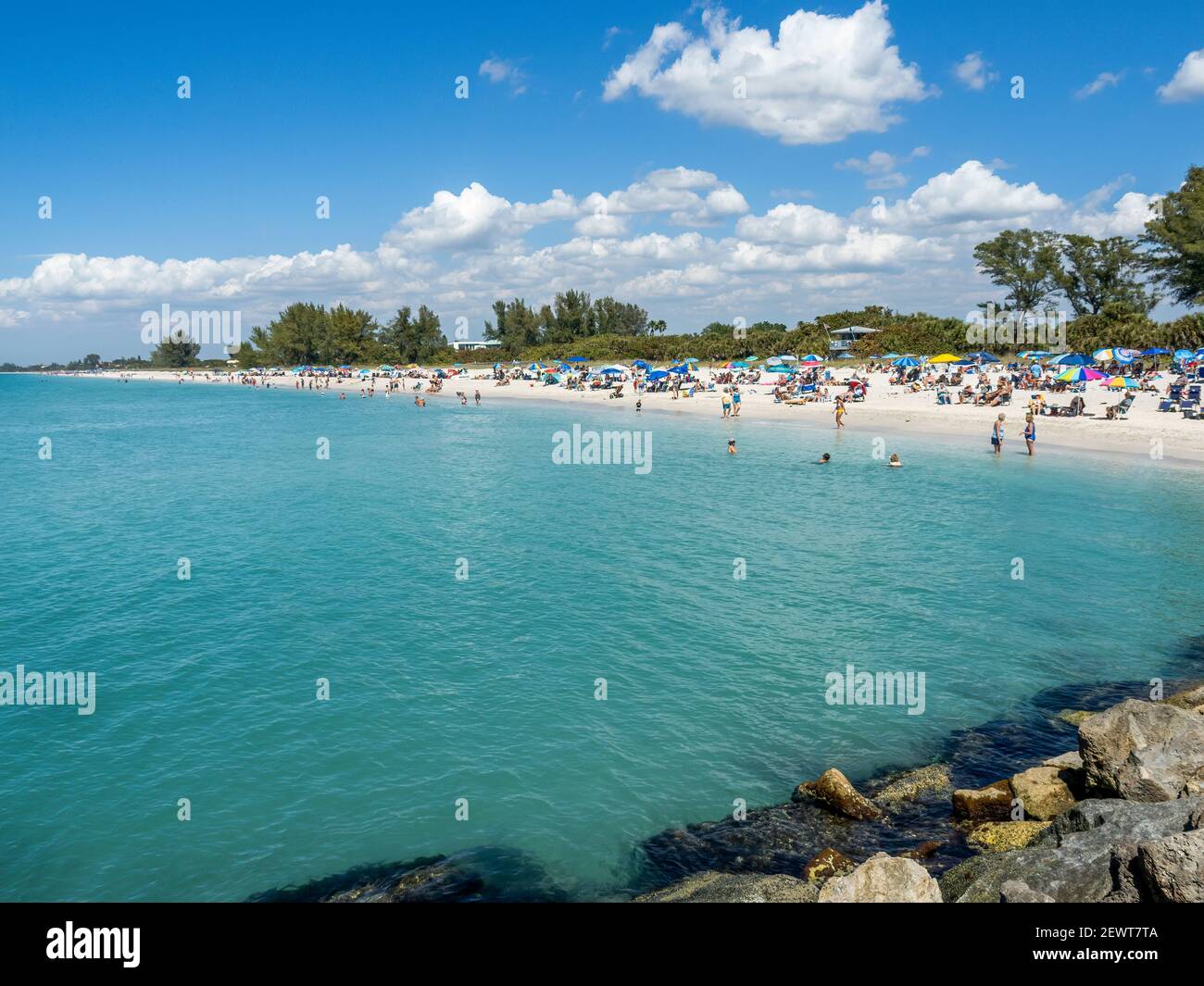 North Jetty Beach on the Gulf of Mexico during high tourist season in ...