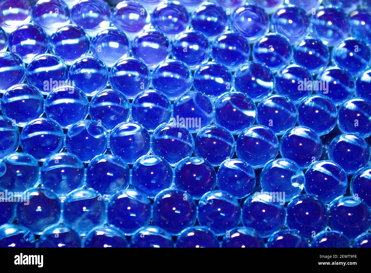 Water blue gel balls. Polymer gel. Silica gel. Balls of blue hydrogel ...