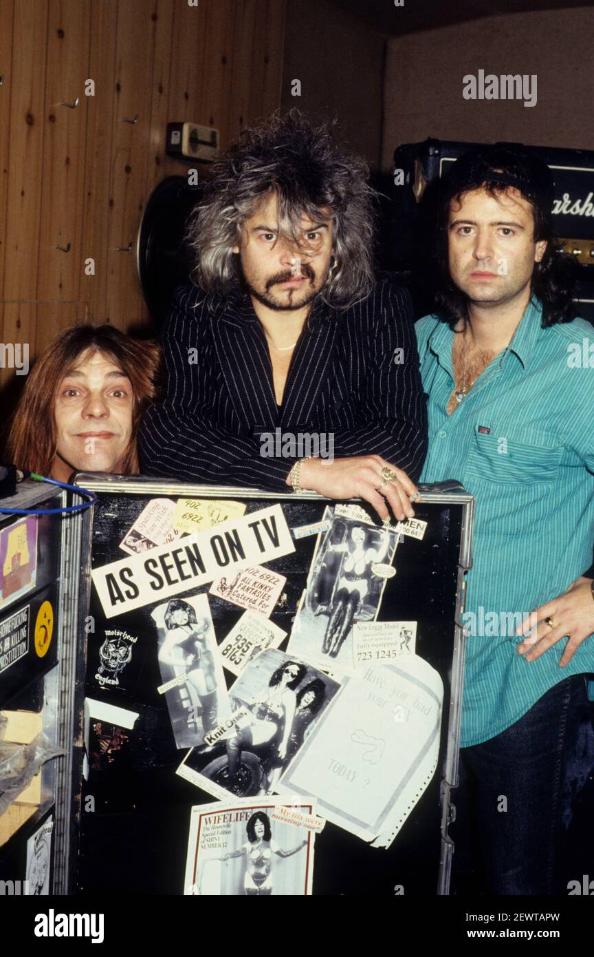 Michael 'Root' Burston, Phil 'Philthy Animal' Taylor and Phil 'Wizzo ...