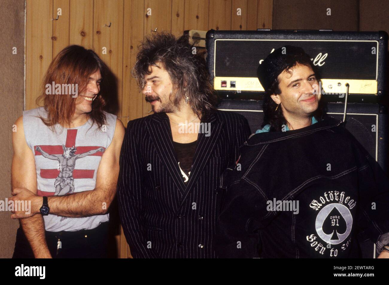 Michael 'Root' Burston, Phil 'Philthy Animal' Taylor and Phil 'Wizzo' Campbell of Motorhead ...