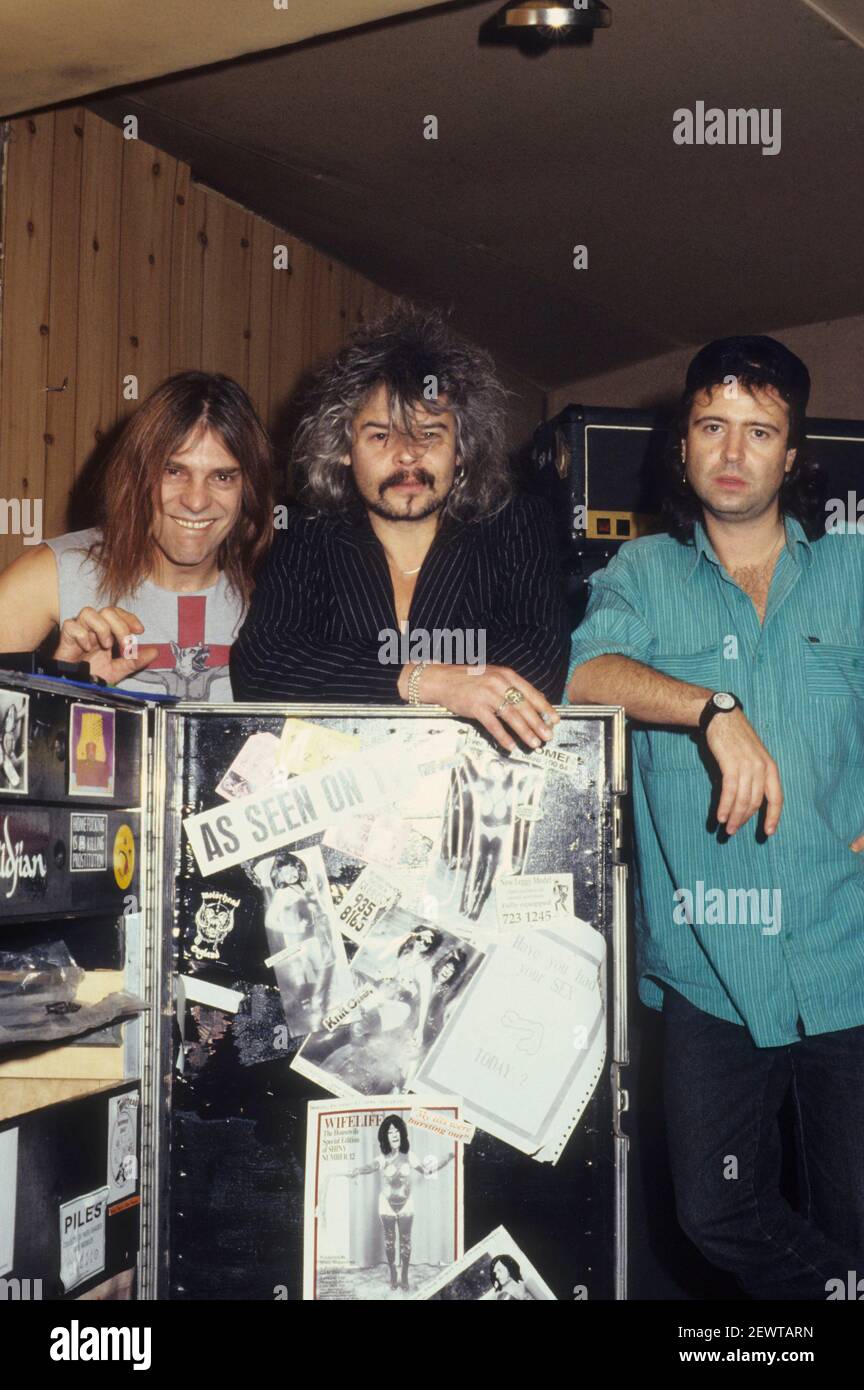 Michael 'Root' Burston, Phil 'Philthy Animal' Taylor and Phil 'Wizzo ...